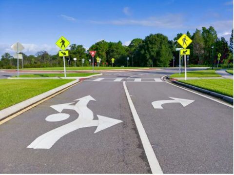 How does car park marking help maintain safety on the road?